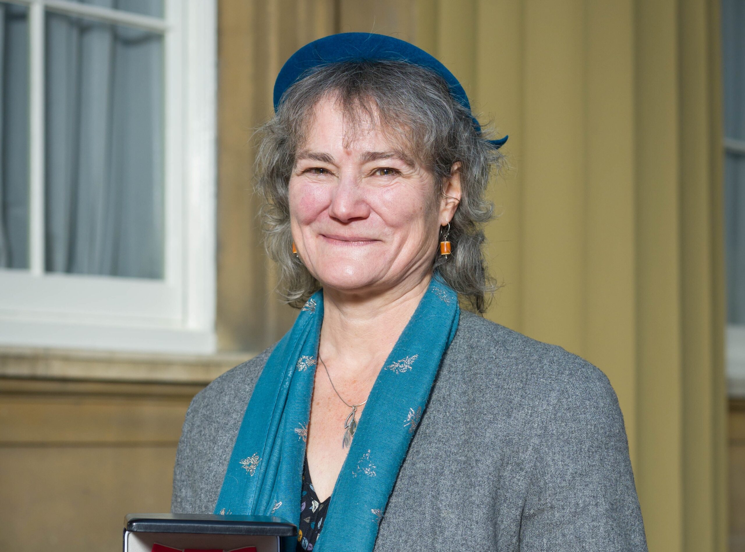 University professor receives OBE medal from Princess Royal at ...